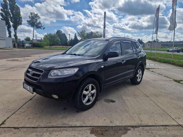 Melns Hyundai Santa Fe 2007 Panevēža, ar dzinēja tilpumu 2.19 L un nobraukumu 220 tūkst. km par 2999 €, foto 3 vietnē AUTOMOTO.COM.LV