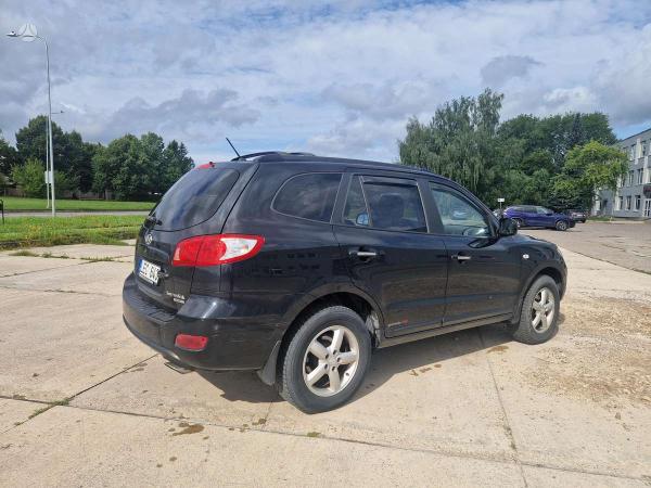 Melns Hyundai Santa Fe 2007 Panevēža, ar dzinēja tilpumu 2.19 L un nobraukumu 220 tūkst. km par 2999 €, foto 4 vietnē AUTOMOTO.COM.LV