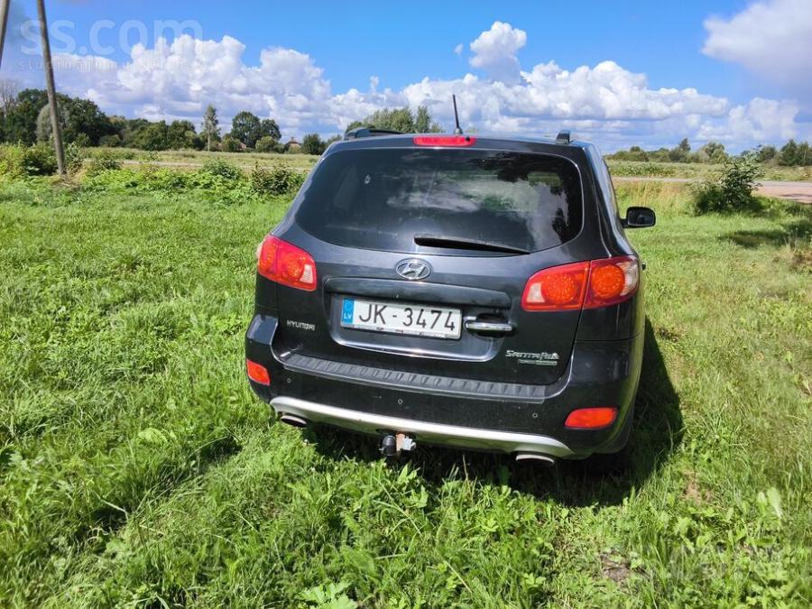 Melns Hyundai Santa Fe 2007 Jelgava, ar dzinēja tilpumu 2.20 L un nobraukumu 230 tūkst. km par 3500 €, foto 5 vietnē AUTOMOTO.COM.LV