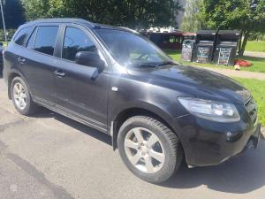 Black Hyundai Santa Fe 2007 in Vilnius, with an engine capacity of 2.19 L and mileage of 320 thousand km for 1750 €, photo 3 on AUTOMOTO.COM.LV