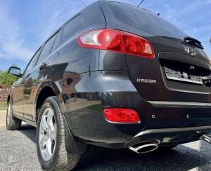 Black Hyundai Santa Fe 2007 in Marijampole, with an engine capacity of 2.19 L and mileage of 245 thousand km for 4490 €, photo 12 on AUTOMOTO.COM.LV
