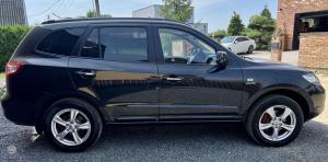 Black Hyundai Santa Fe 2007 in Marijampole, with an engine capacity of 2.19 L and mileage of 245 thousand km for 4490 €, photo 13 on AUTOMOTO.COM.LV