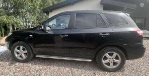 Black Hyundai Santa Fe 2007 in Klaipeda, with an engine capacity of 2.19 L and mileage of 317 thousand km for 2800 €, photo 4 on AUTOMOTO.COM.LV