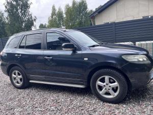 Black Hyundai Santa Fe 2007 in Klaipeda, with an engine capacity of 2.19 L and mileage of 317 thousand km for 2800 €, photo 5 on AUTOMOTO.COM.LV