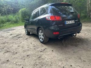 Black Hyundai Santa Fe 2007 in Vilnius, with an engine capacity of 2.19 L and mileage of 331 thousand km for 1850 €, photo 12 on AUTOMOTO.COM.LV