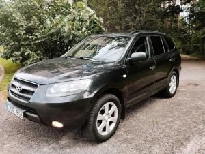 Black Hyundai Santa Fe 2007 in Vilnius, with an engine capacity of 2.19 L and mileage of 326 thousand km for 2950 €, photo 10 on AUTOMOTO.COM.LV