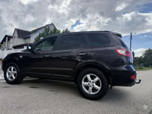 Black Hyundai Santa Fe 2007 in Marijampole, with an engine capacity of 2.19 L and mileage of 242 thousand km for 2999 €, photo 5 on AUTOMOTO.COM.LV