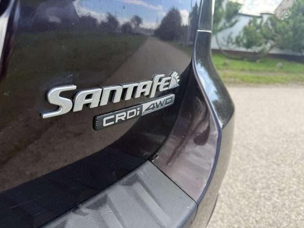 Black Hyundai Santa Fe 2007 in Marijampole, with an engine capacity of 2.19 L and mileage of 242 thousand km for 2999 €, photo 11 on AUTOMOTO.COM.LV