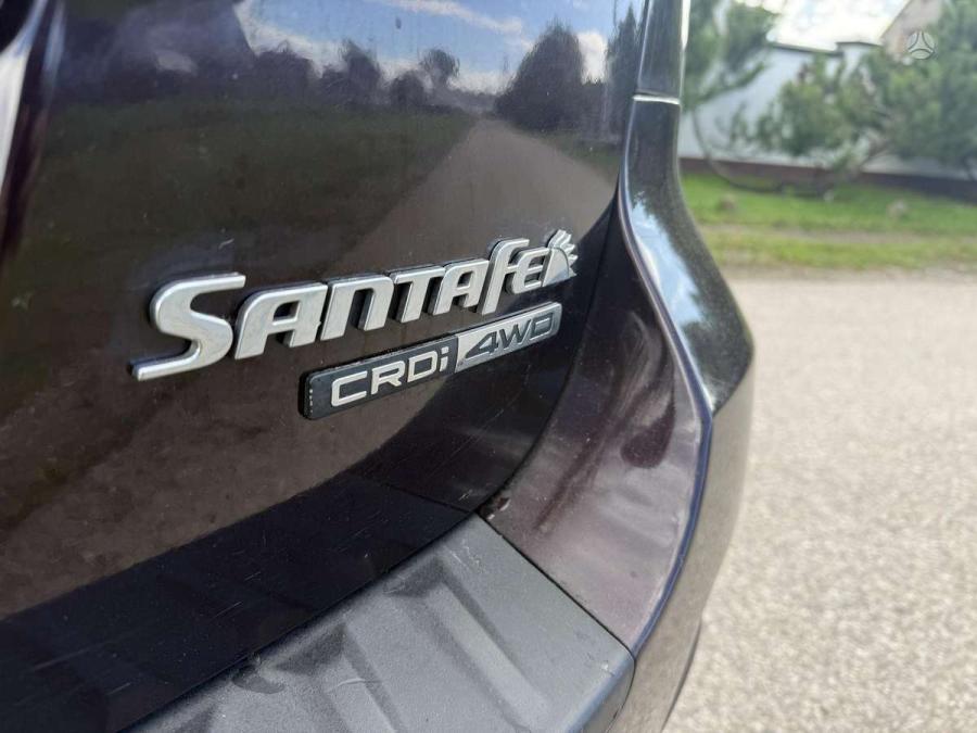 Black Hyundai Santa Fe 2007 in Marijampole, with an engine capacity of 2.19 L and mileage of 242 thousand km for 2999 €, photo 11 on AUTOMOTO.COM.LV