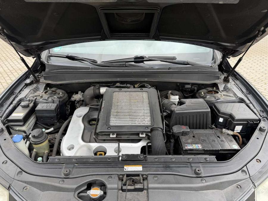 Black Hyundai Santa Fe 2007 in Marijampole, with an engine capacity of 2.19 L and mileage of 242 thousand km for 2950 €, photo 21 on AUTOMOTO.COM.LV