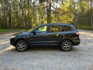 Melns Hyundai Santa Fe 2007 Rīga, ar dzinēja tilpumu 2.20 L un nobraukumu 0 tūkst. km par 3899 €, foto 3 vietnē AUTOMOTO.COM.LV