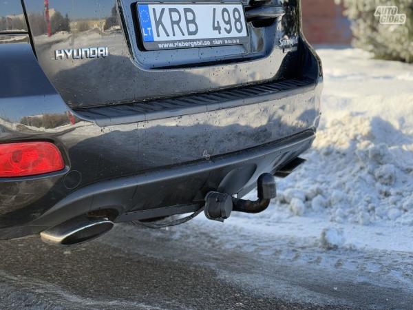 Black Hyundai Santa Fe 2008 in Kaunas, with an engine capacity of 2.20 L and mileage of 311 thousand km for 4000 €, photo 5 on AUTOMOTO.COM.LV