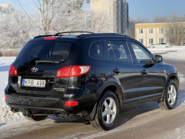 Black Hyundai Santa Fe 2008 in Kaunas, with an engine capacity of 2.19 L and mileage of 311 thousand km for 4000 €, photo 3 on AUTOMOTO.COM.LV