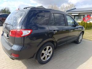 Black Hyundai Santa Fe 2008 in Vilnius, with an engine capacity of 2.20 L and mileage of 283 thousand km for 3299 €, photo 4 on AUTOMOTO.COM.LV