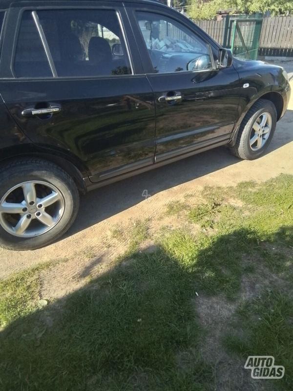 Melns Hyundai Santa Fe 2008 Panevēža, ar dzinēja tilpumu 2.20 L un nobraukumu 220 tūkst. km par 2700 €, foto 10 vietnē AUTOMOTO.COM.LV