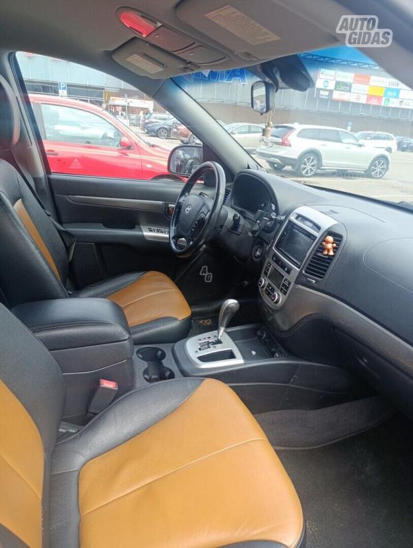 Black Hyundai Santa Fe 2008 in Kaunas, with an engine capacity of 2.20 L and mileage of 209 thousand km for 3900 €, photo 6 on AUTOMOTO.COM.LV