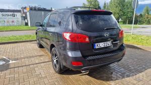 Melns Hyundai Santa Fe 2008 Rīga, ar dzinēja tilpumu 2.20 L un nobraukumu 245 tūkst. km par 3800 €, foto 4 vietnē AUTOMOTO.COM.LV