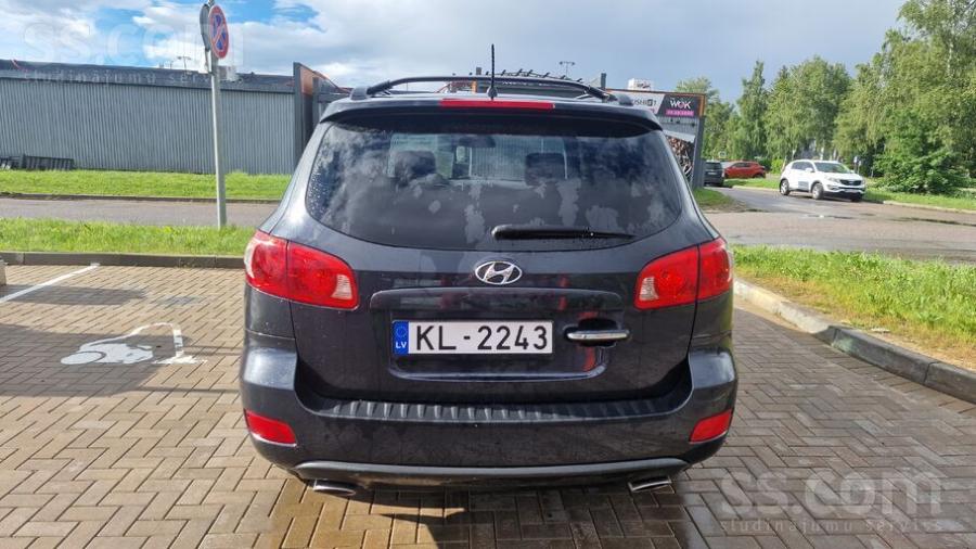 Melns Hyundai Santa Fe 2008 Rīga, ar dzinēja tilpumu 2.20 L un nobraukumu 245 tūkst. km par 3800 €, foto 7 vietnē AUTOMOTO.COM.LV