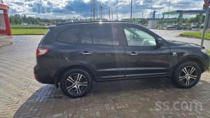 Melns Hyundai Santa Fe 2008 Rīga, ar dzinēja tilpumu 2.20 L un nobraukumu 245 tūkst. km par 3800 €, foto 8 vietnē AUTOMOTO.COM.LV