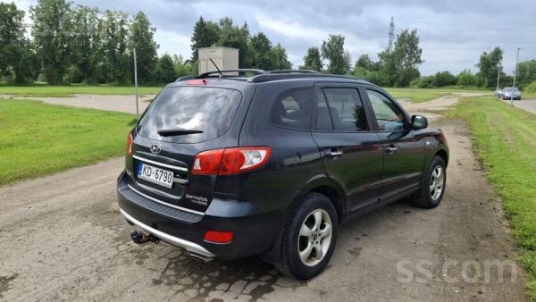 Melns Hyundai Santa Fe 2008 Jelgava, ar dzinēja tilpumu 2.20 L un nobraukumu 319 tūkst. km par 3700 €, foto 4 vietnē AUTOMOTO.COM.LV