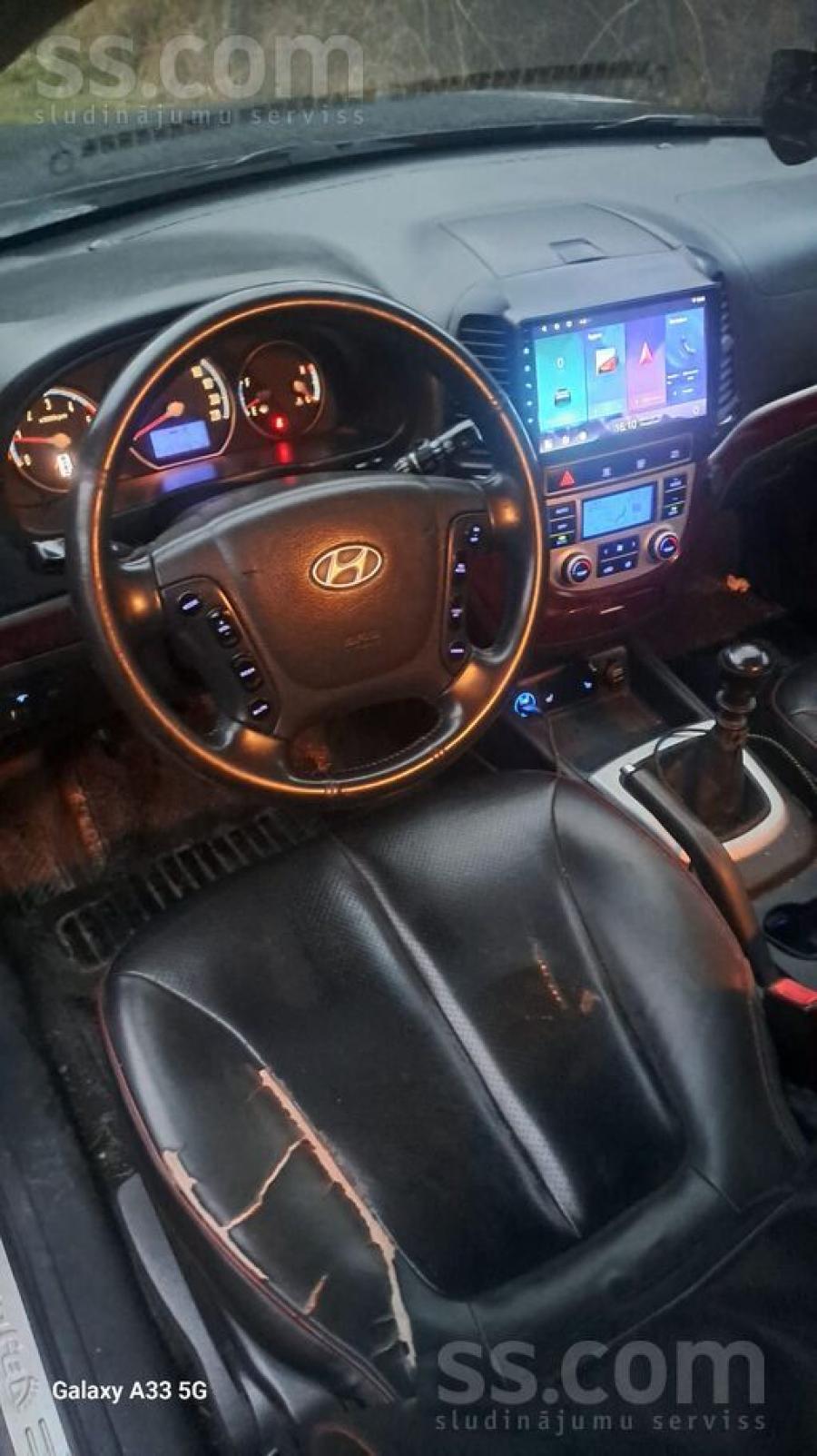 Black Hyundai Santa Fe 2008 in Riga, with an engine capacity of 2.20 L and mileage of 270 thousand km for 2000 €, photo 7 on AUTOMOTO.COM.LV