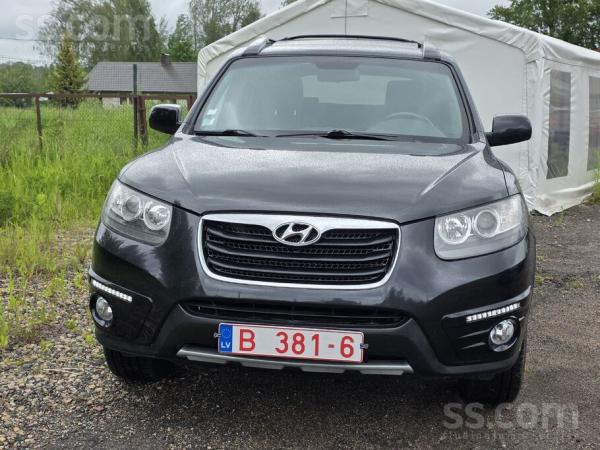 Melns Hyundai Santa Fe 2009 Ogre, ar dzinēja tilpumu 2.20 L un nobraukumu 216 tūkst. km par 5995 €, foto 2 vietnē AUTOMOTO.COM.LV
