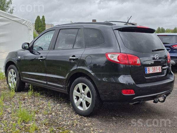 Melns Hyundai Santa Fe 2009 Ogre, ar dzinēja tilpumu 2.20 L un nobraukumu 216 tūkst. km par 5995 €, foto 4 vietnē AUTOMOTO.COM.LV