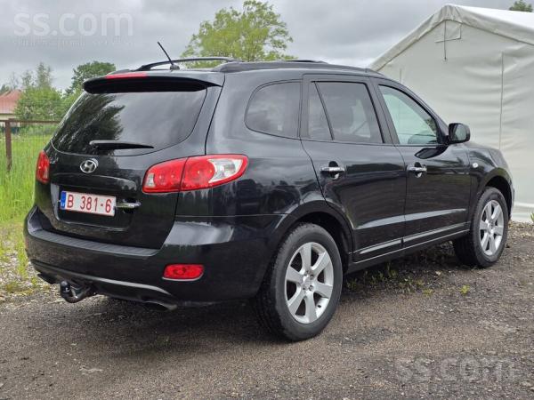 Melns Hyundai Santa Fe 2009 Ogre, ar dzinēja tilpumu 2.20 L un nobraukumu 216 tūkst. km par 5995 €, foto 6 vietnē AUTOMOTO.COM.LV