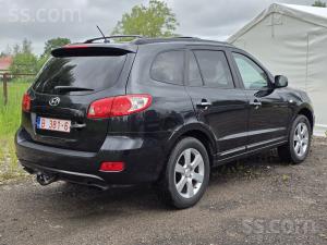 Melns Hyundai Santa Fe 2009 Ogre, ar dzinēja tilpumu 2.20 L un nobraukumu 216 tūkst. km par 5995 €, foto 6 vietnē AUTOMOTO.COM.LV