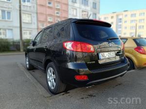 Black Hyundai Santa Fe 2009 in Riga, with an engine capacity of 2.20 L and mileage of 248 thousand km for 5090 €, photo  on AUTOMOTO.COM.LV