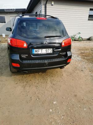 Melns Hyundai Santa Fe 2009 Kauņa, ar dzinēja tilpumu 2.20 L un nobraukumu 301 tūkst. km par 3550 €, foto 3 vietnē AUTOMOTO.COM.LV