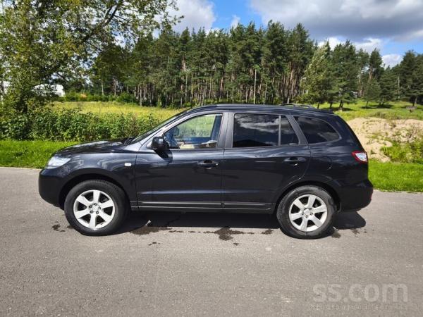 Melns Hyundai Santa Fe 2009 Daugavpils, ar dzinēja tilpumu 2.20 L un nobraukumu 230 tūkst. km par 5800 €, foto 1 vietnē AUTOMOTO.COM.LV