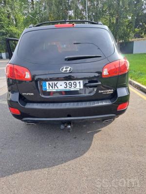 Melns Hyundai Santa Fe 2009 Rīga, ar dzinēja tilpumu 2.20 L un nobraukumu 258 tūkst. km par 4850 €, foto 8 vietnē AUTOMOTO.COM.LV