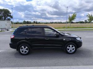 Black Hyundai Santa Fe 2009 in Marijampole, with an engine capacity of 2.19 L and mileage of 310 thousand km for 3900 €, photo 7 on AUTOMOTO.COM.LV
