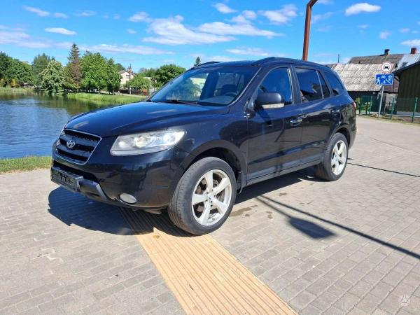 Melns Hyundai Santa Fe 2009 Raseiniai, ar dzinēja tilpumu 2.19 L un nobraukumu 345 tūkst. km par 2400 €, foto 1 vietnē AUTOMOTO.COM.LV