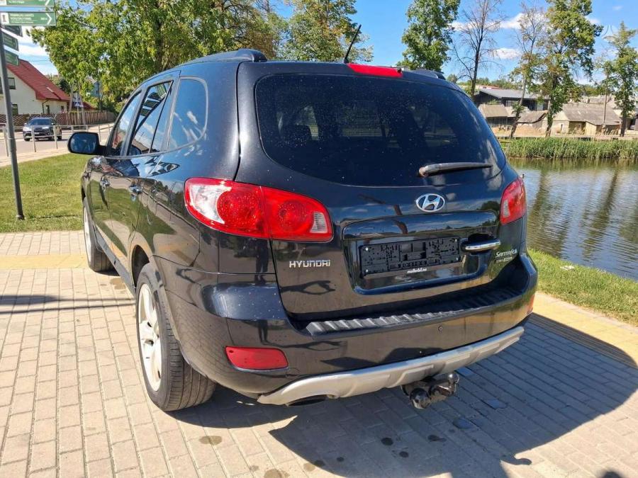Melns Hyundai Santa Fe 2009 Raseiniai, ar dzinēja tilpumu 2.19 L un nobraukumu 345 tūkst. km par 2400 €, foto 3 vietnē AUTOMOTO.COM.LV