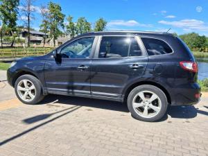 Melns Hyundai Santa Fe 2009 Raseiniai, ar dzinēja tilpumu 2.19 L un nobraukumu 345 tūkst. km par 2400 €, foto 7 vietnē AUTOMOTO.COM.LV