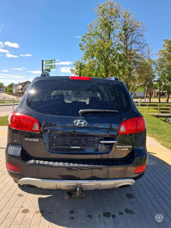 Melns Hyundai Santa Fe 2009 Raseiniai, ar dzinēja tilpumu 2.19 L un nobraukumu 345 tūkst. km par 2400 €, foto 7 vietnē AUTOMOTO.COM.LV