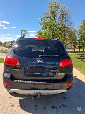 Melns Hyundai Santa Fe 2009 Raseiniai, ar dzinēja tilpumu 2.19 L un nobraukumu 345 tūkst. km par 2400 €, foto 8 vietnē AUTOMOTO.COM.LV