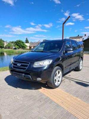 Melns Hyundai Santa Fe 2009 Raseiniai, ar dzinēja tilpumu 2.19 L un nobraukumu 345 tūkst. km par 2400 €, foto 10 vietnē AUTOMOTO.COM.LV