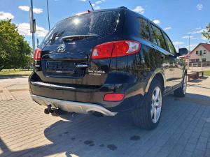 Melns Hyundai Santa Fe 2009 Raseiniai, ar dzinēja tilpumu 2.19 L un nobraukumu 345 tūkst. km par 2400 €, foto 12 vietnē AUTOMOTO.COM.LV
