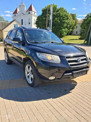 Melns Hyundai Santa Fe 2009 Raseiniai, ar dzinēja tilpumu 2.19 L un nobraukumu 345 tūkst. km par 2400 €, foto 14 vietnē AUTOMOTO.COM.LV