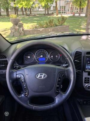 Melns Hyundai Santa Fe 2009 Raseiniai, ar dzinēja tilpumu 2.19 L un nobraukumu 345 tūkst. km par 2400 €, foto 23 vietnē AUTOMOTO.COM.LV