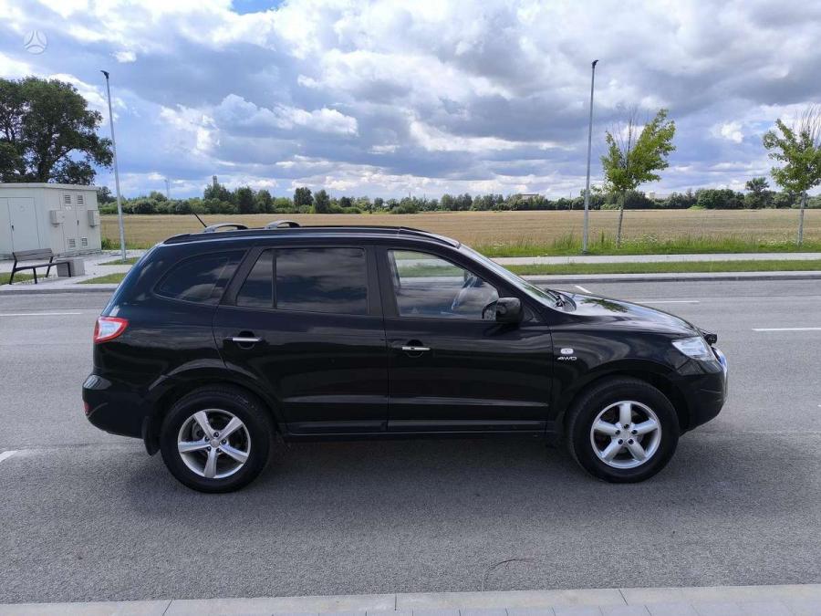 Melns Hyundai Santa Fe 2009 Marijampole, ar dzinēja tilpumu 2.19 L un nobraukumu 310 tūkst. km par 3200 €, foto 9 vietnē AUTOMOTO.COM.LV