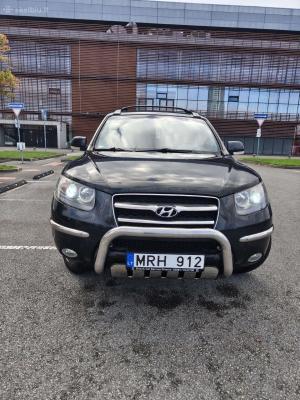 Melns Hyundai Santa Fe 2009 Klaipėda, ar dzinēja tilpumu 2.20 L un nobraukumu 263 tūkst. km par 4600 €, foto  vietnē AUTOMOTO.COM.LV
