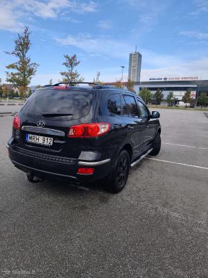 Melns Hyundai Santa Fe 2009 Klaipėda, ar dzinēja tilpumu 2.20 L un nobraukumu 263 tūkst. km par 4600 €, foto 6 vietnē AUTOMOTO.COM.LV