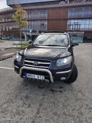 Melns Hyundai Santa Fe 2009 Klaipėda, ar dzinēja tilpumu 2.20 L un nobraukumu 263 tūkst. km par 4600 €, foto 11 vietnē AUTOMOTO.COM.LV