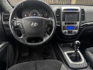 Melns Hyundai Santa Fe 2010 Rīga, ar dzinēja tilpumu 2.20 L un nobraukumu 333 tūkst. km par 3900 €, foto 10 vietnē AUTOMOTO.COM.LV