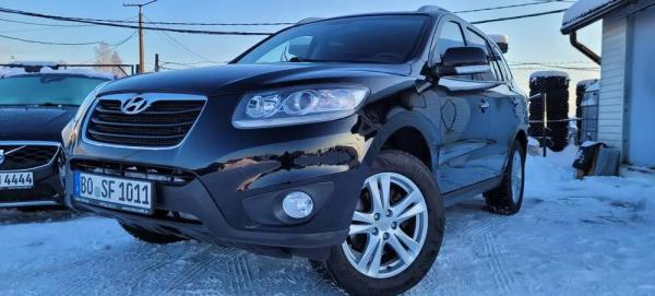 Melns Hyundai Santa Fe 2010 Rīga, ar dzinēja tilpumu 2.20 L un nobraukumu 259 tūkst. km par 8900 €, foto 1 vietnē AUTOMOTO.COM.LV