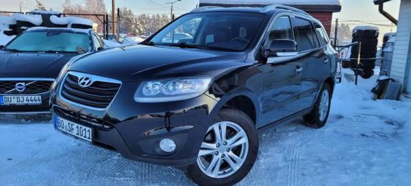 Melns Hyundai Santa Fe 2010 Rīga, ar dzinēja tilpumu 2.20 L un nobraukumu 259 tūkst. km par 8900 €, foto 3 vietnē AUTOMOTO.COM.LV